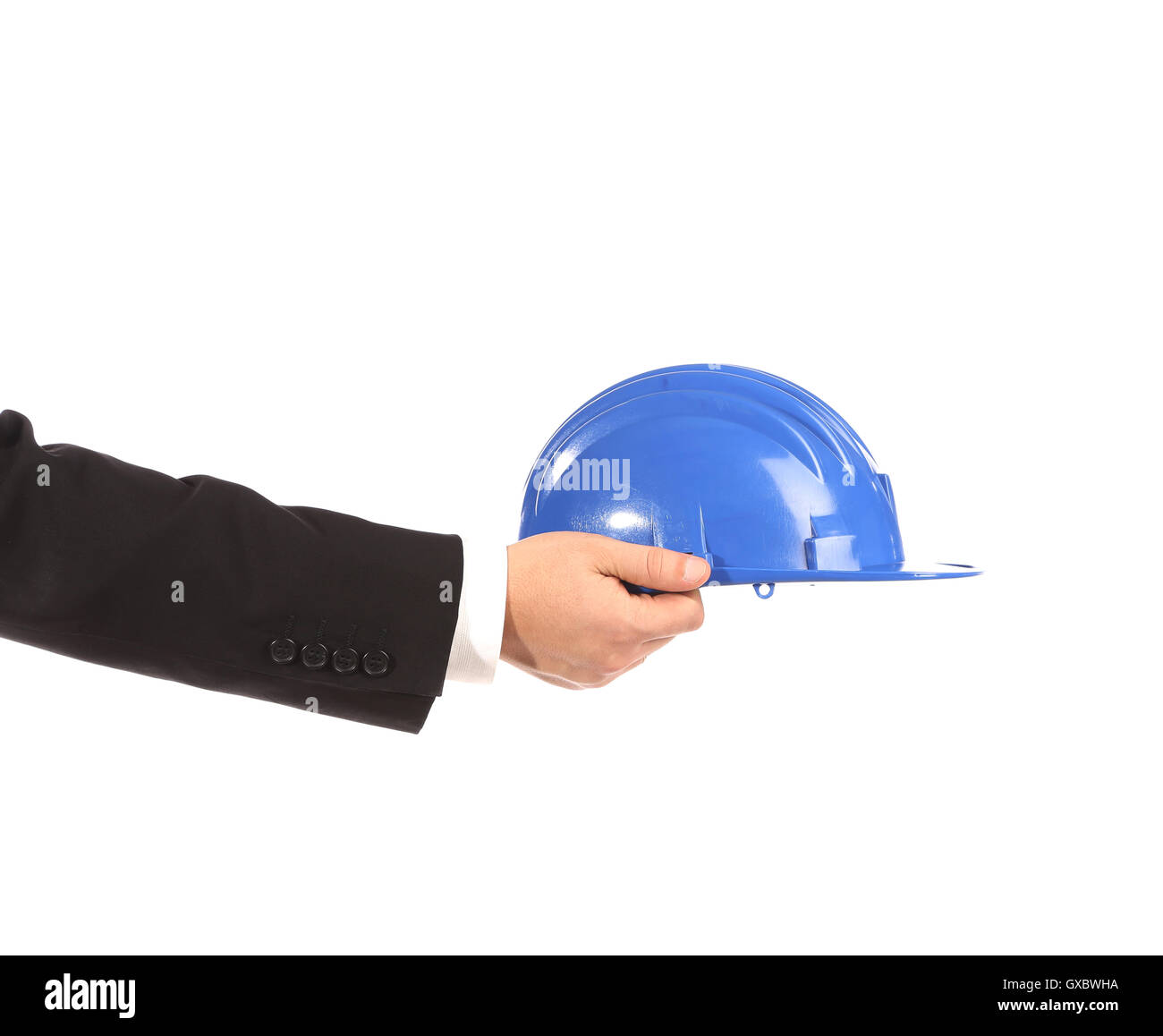 Hand holding blue hard hat isolated Stock Photo - Alamy