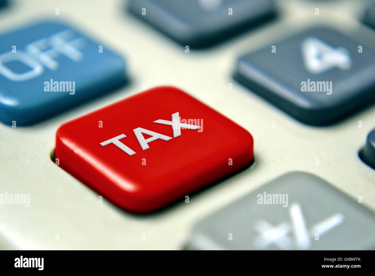 Tax Calculator with Red Button Stock Photo - Alamy