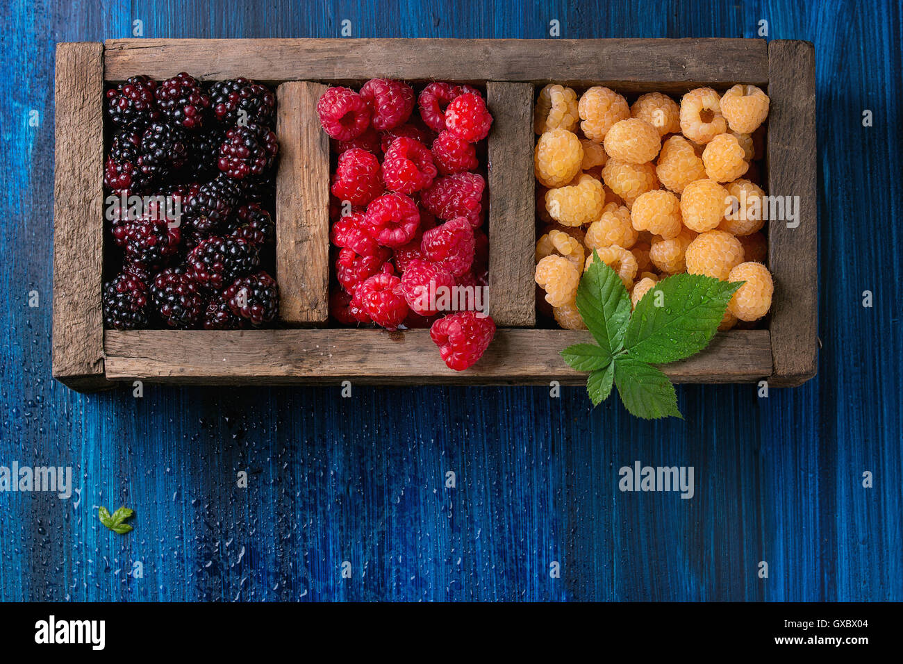 Heap of colorful raspberries Stock Photo - Alamy