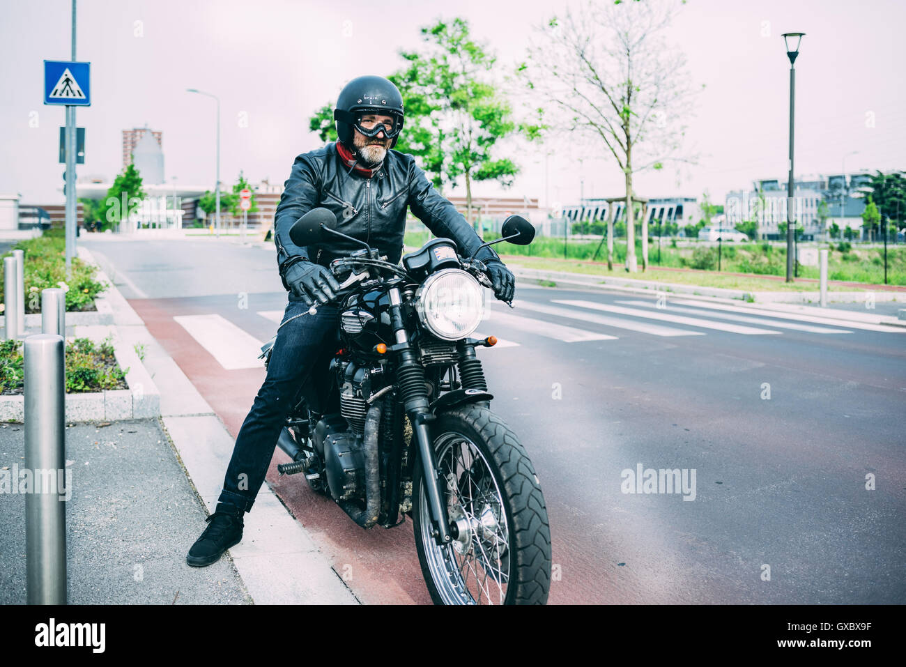 Sitting motorcycle hi-res stock photography and images - Alamy