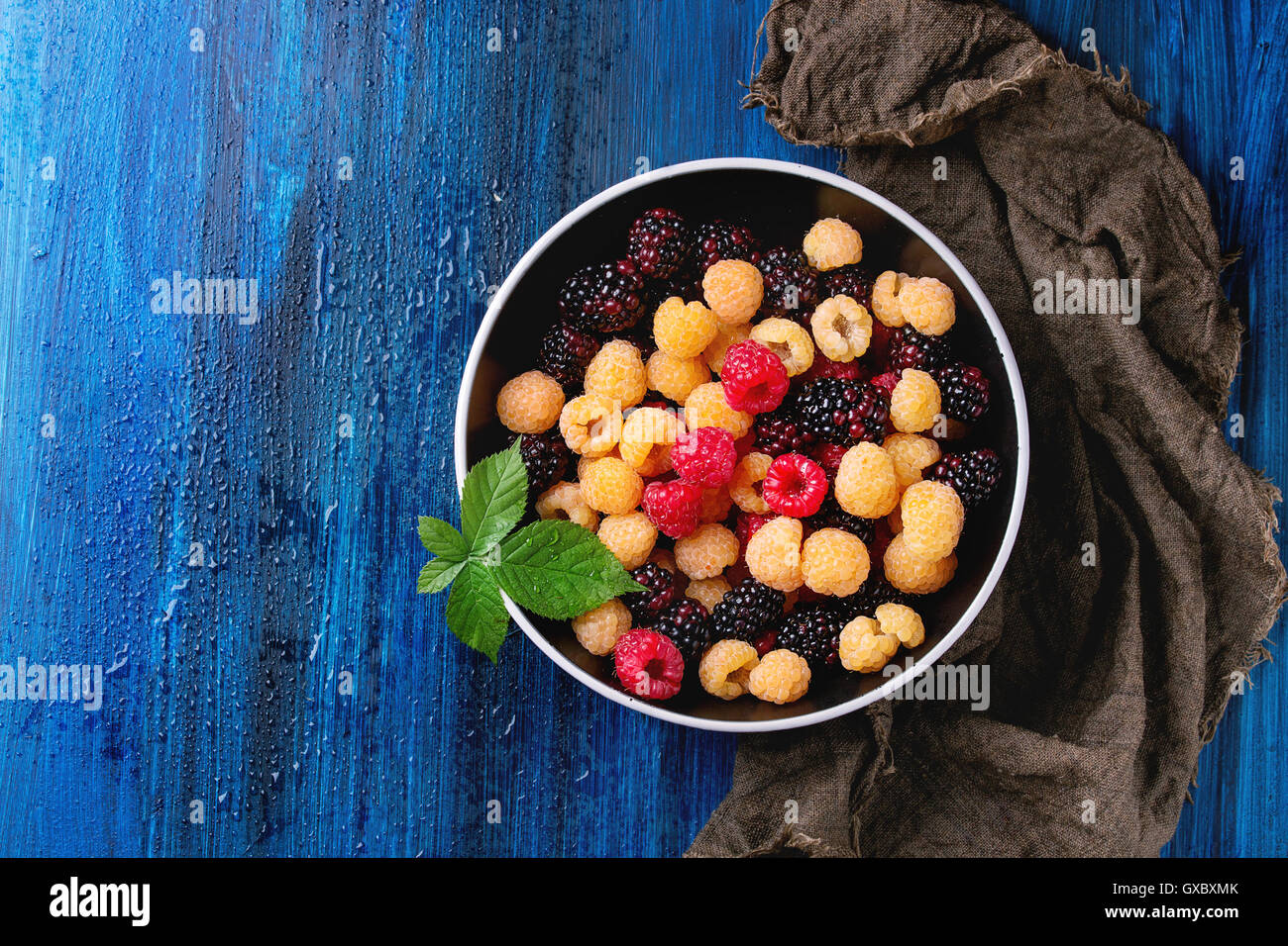 Heap of colorful raspberries Stock Photo - Alamy