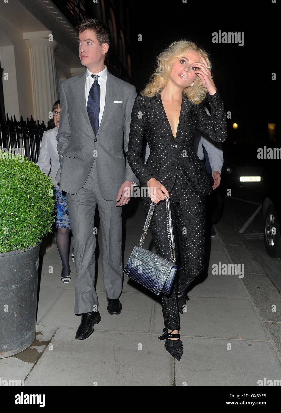 Pixie Lott wearing a smart suit as she leaves the Haymarket Theatre ...
