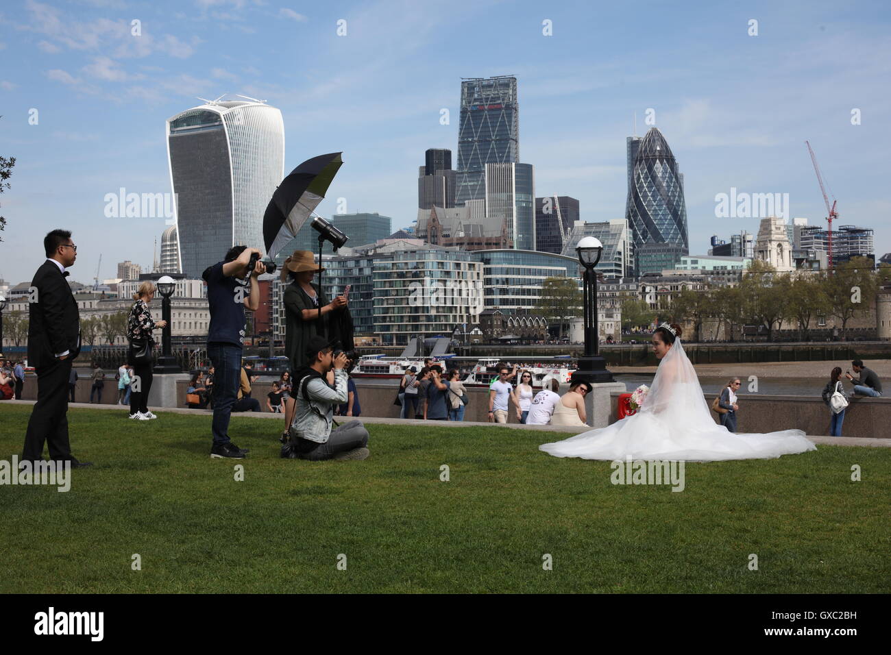 Photoshoot of Bride beside landmarks of London Featuring: Bridal group ...
