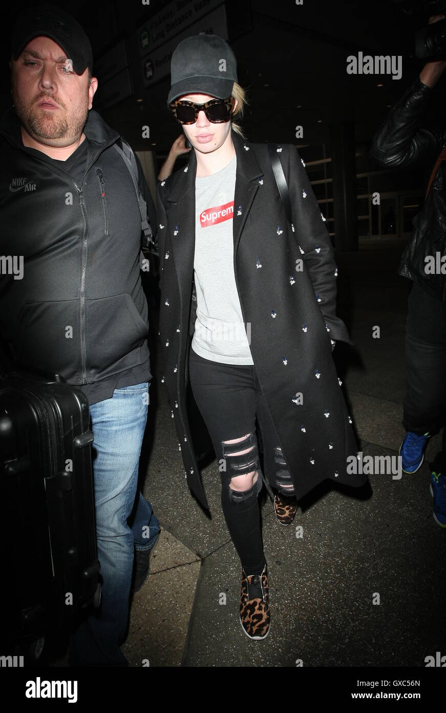 Iggy Azalea arriving at Los Angeles International Airport (LAX) wearing ...