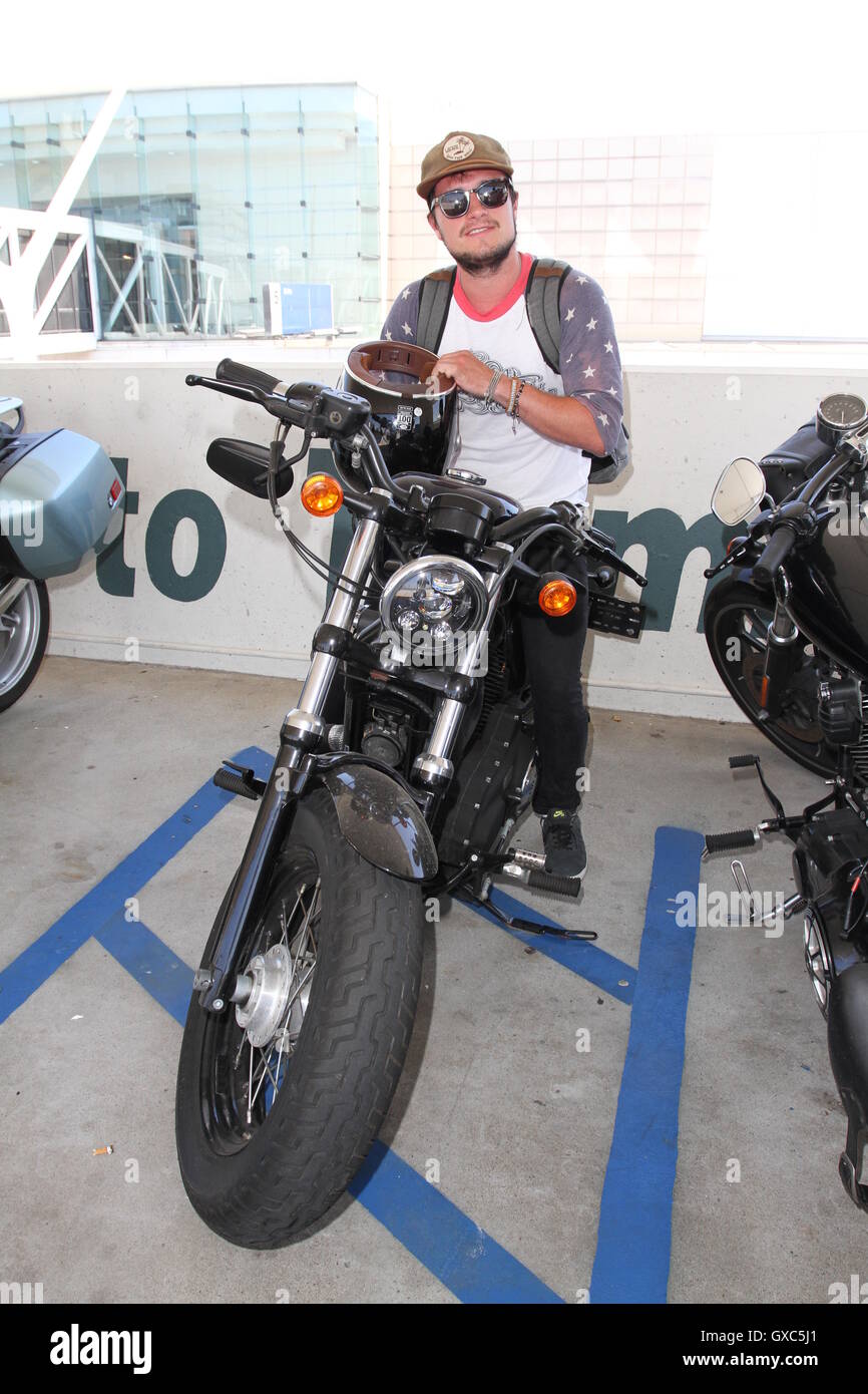 Josh Hutcherson arrives on a motorcycle and departs from LAX Featuring ...