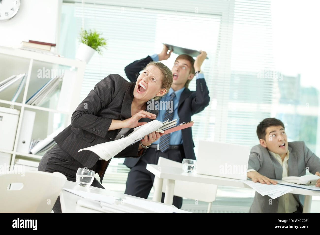 Earthquake in office Stock Photo - Alamy