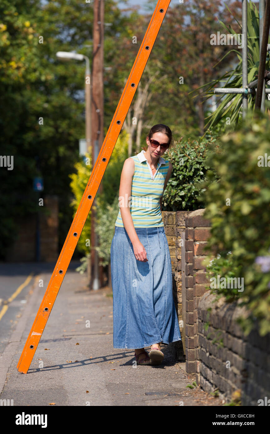 Walking under ladder superstition hi-res stock photography and images ...
