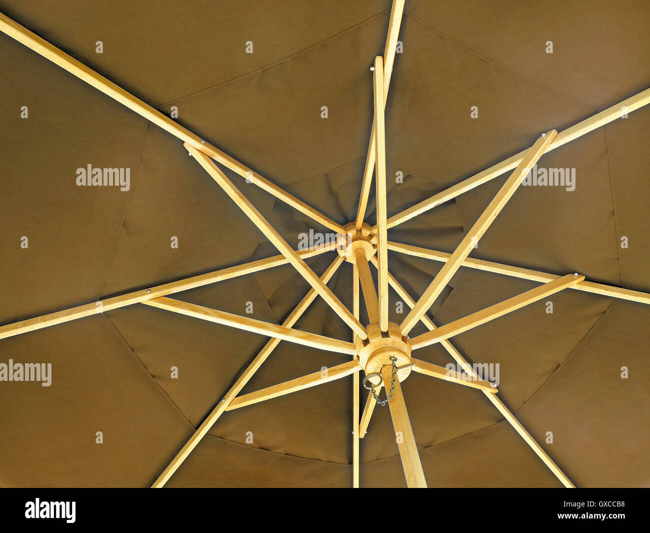 The inside of an open brown umbrella Stock Photo - Alamy
