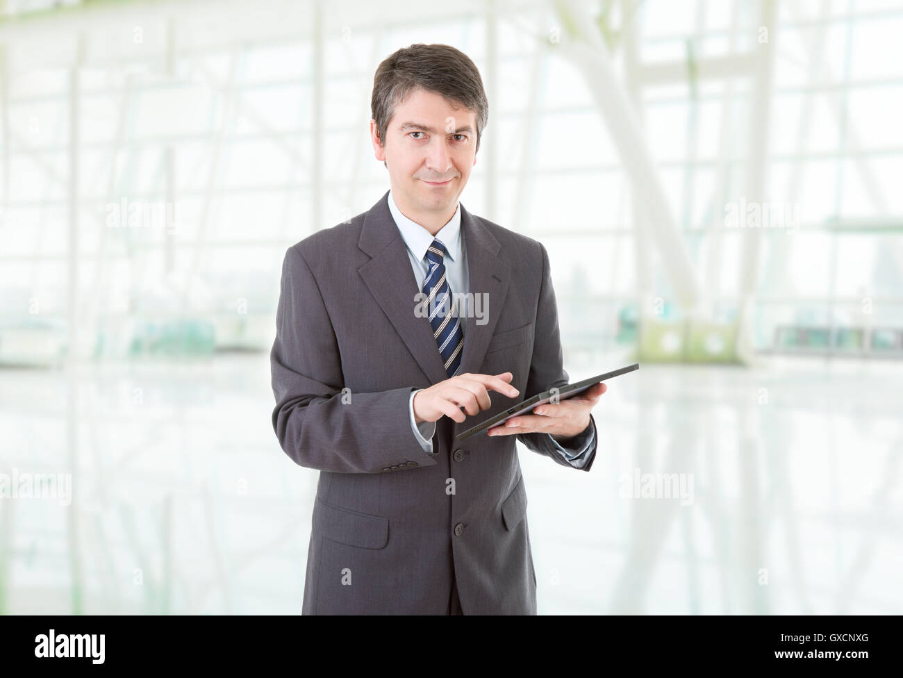 businessman using touch pad of tablet pc, at the office Stock Photo - Alamy