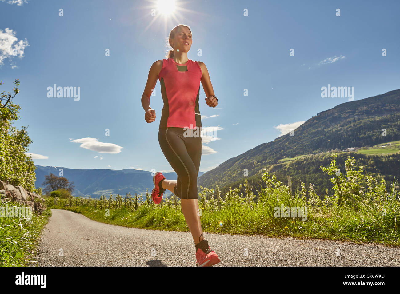Woman jogging low angle hi-res stock photography and images - Alamy