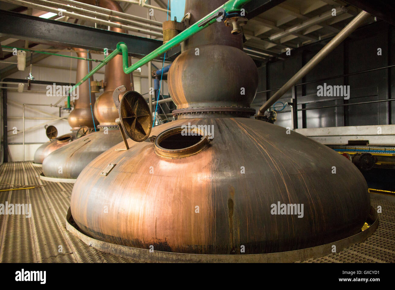Copper whisky stills in whisky distillery Stock Photo - Alamy