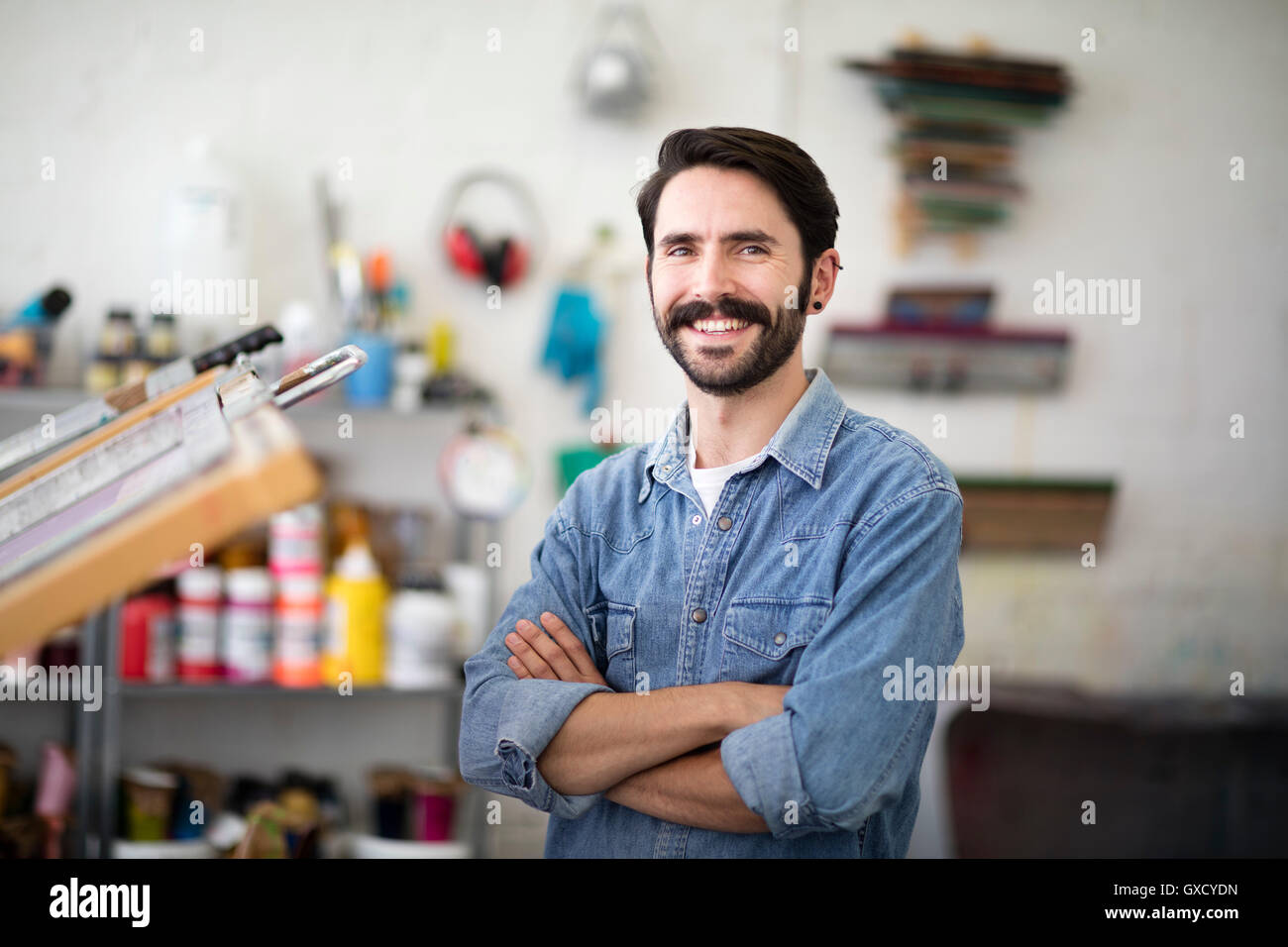 Portrait of young male printer in printing press studio Stock Photo - Alamy