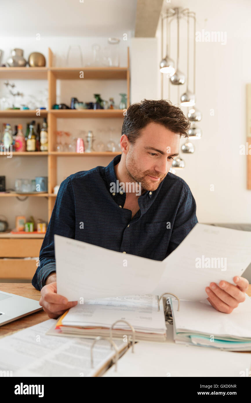 Home, paperwork, adults hi-res stock photography and images - Alamy