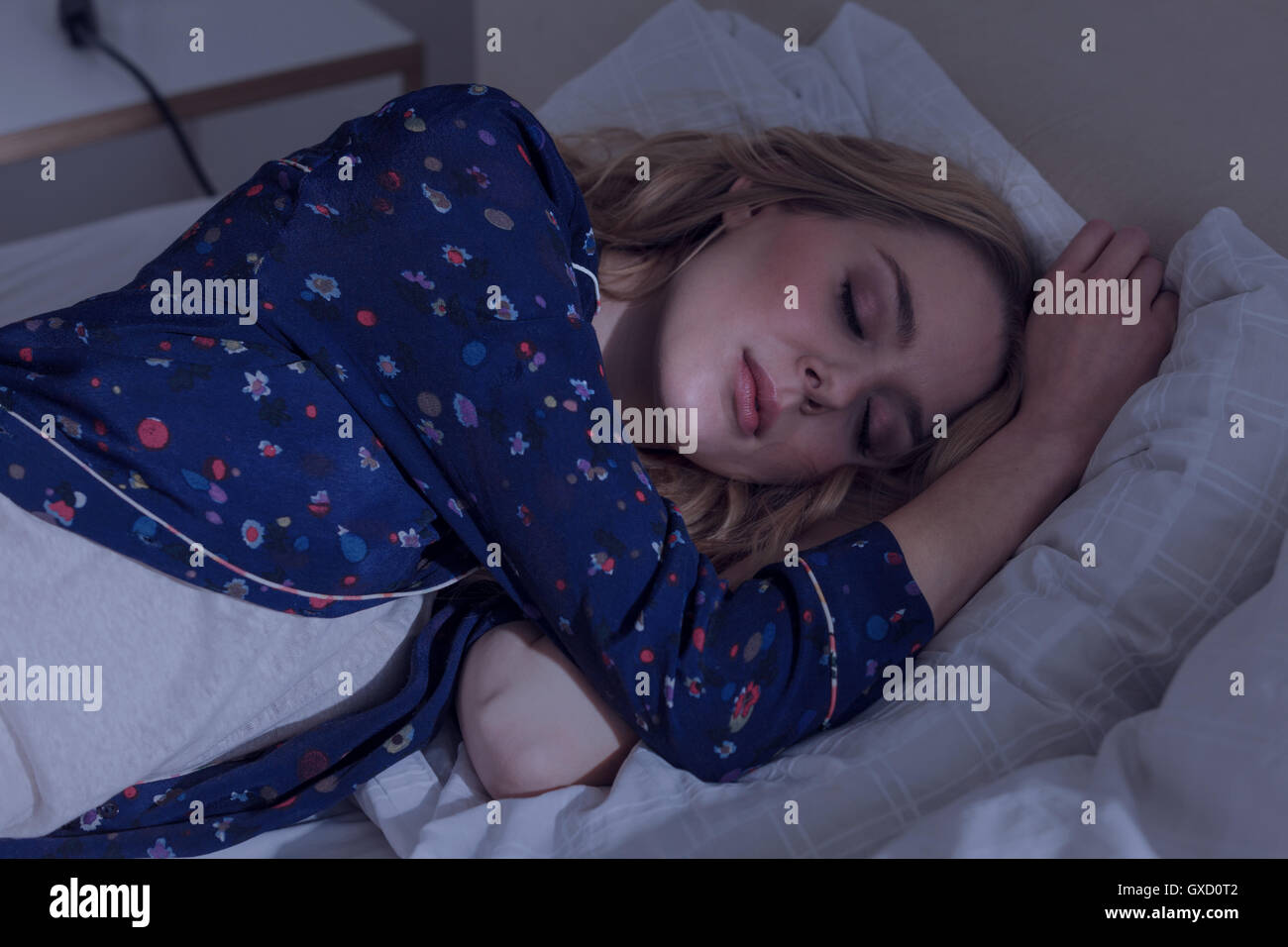 Alone woman night bed hi-res stock photography and images - Alamy