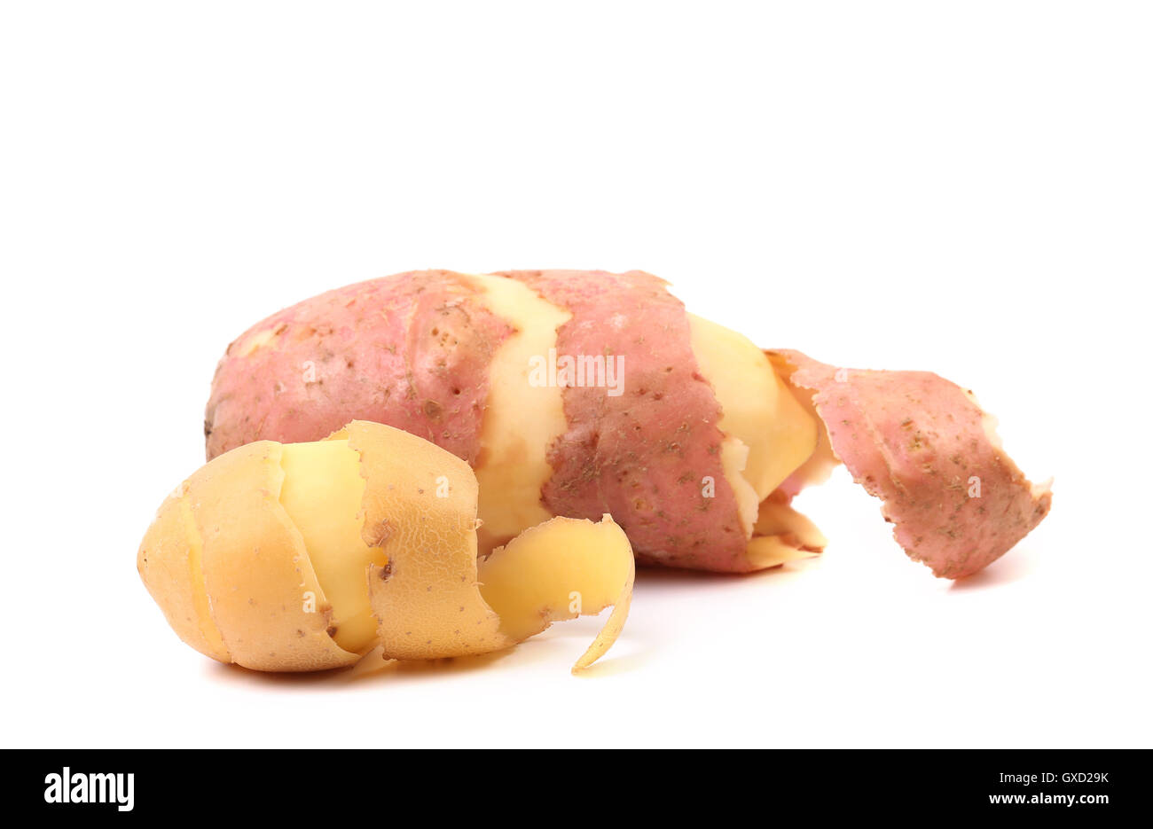 Two potatoes peel isolated Stock Photo - Alamy