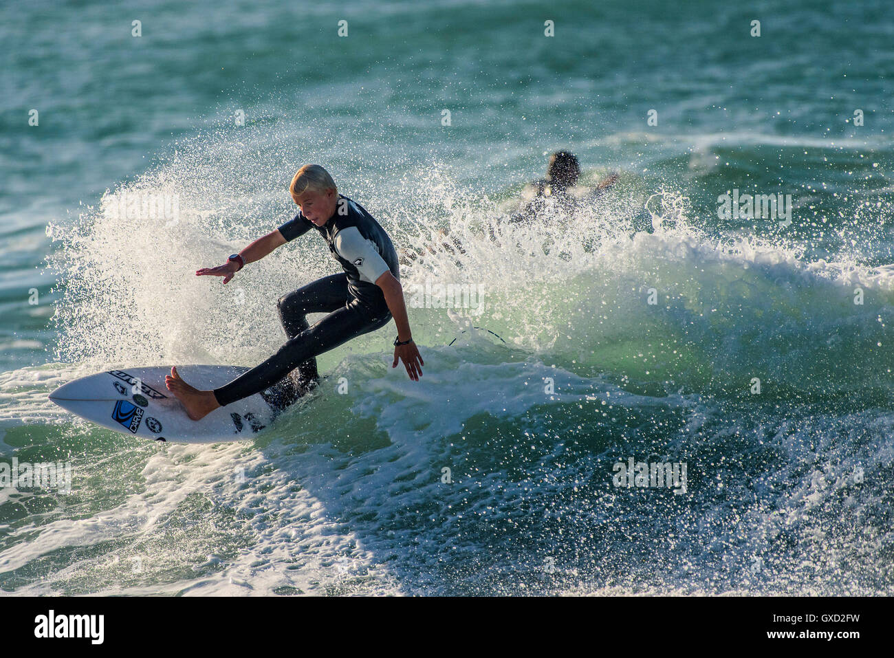 A young Sol Hawkins in spectacular surfing action at Fistral in Newquay ...
