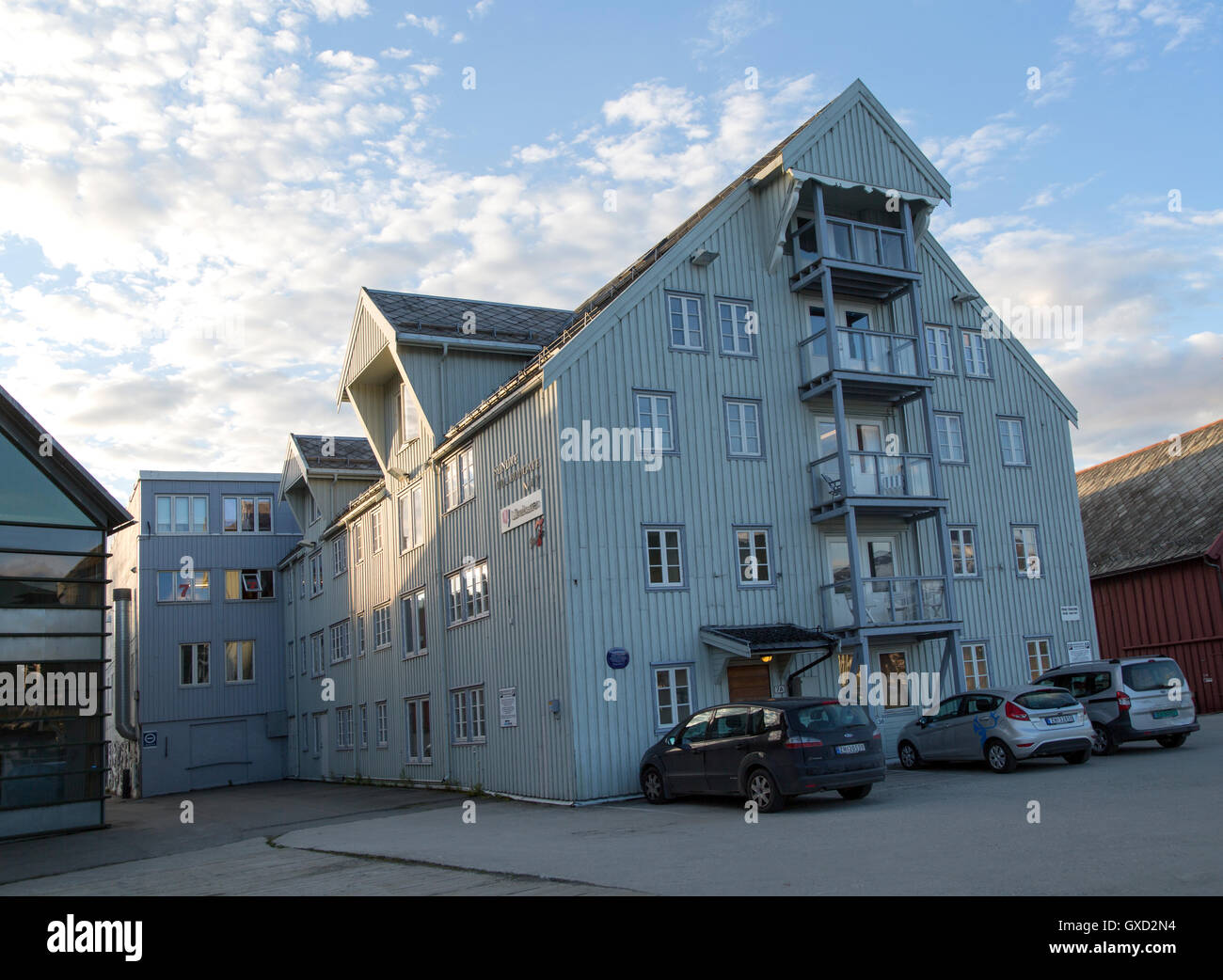 Waterside old warehouse wooden buildings harbour area, Tromso, Norway ...