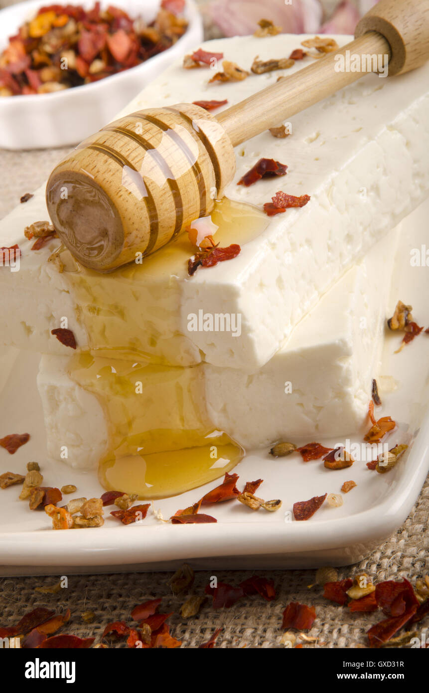 goat cheese with honey and chili flakes Stock Photo - Alamy