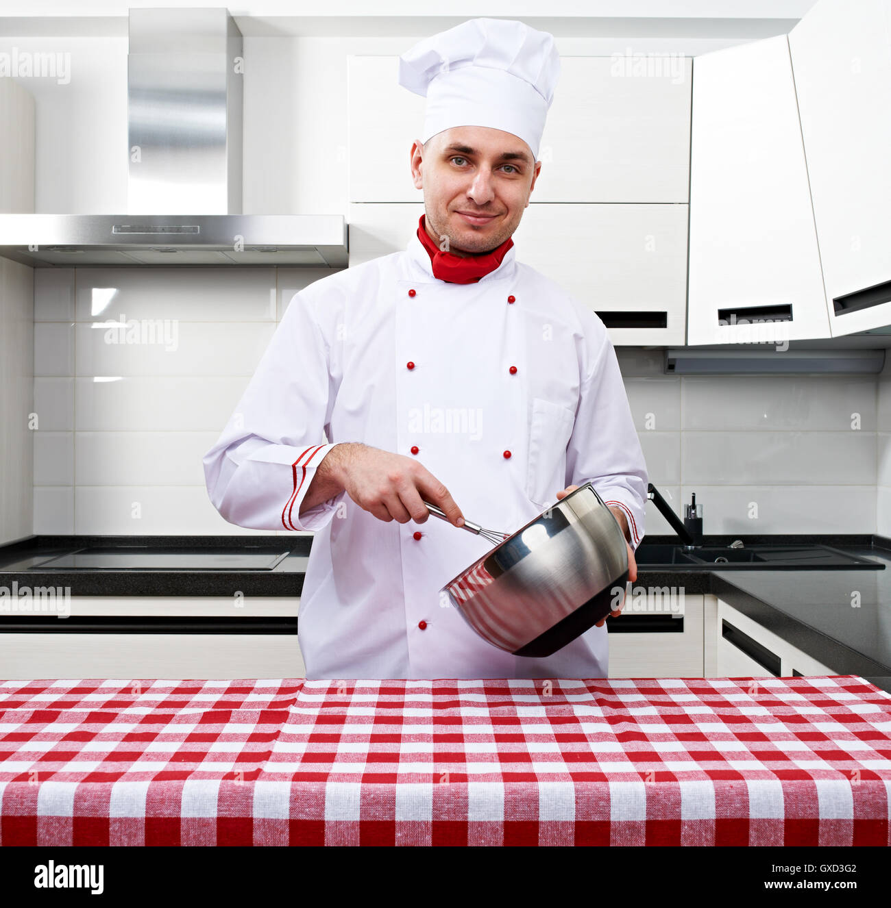 Male chef at kitchen Stock Photo - Alamy