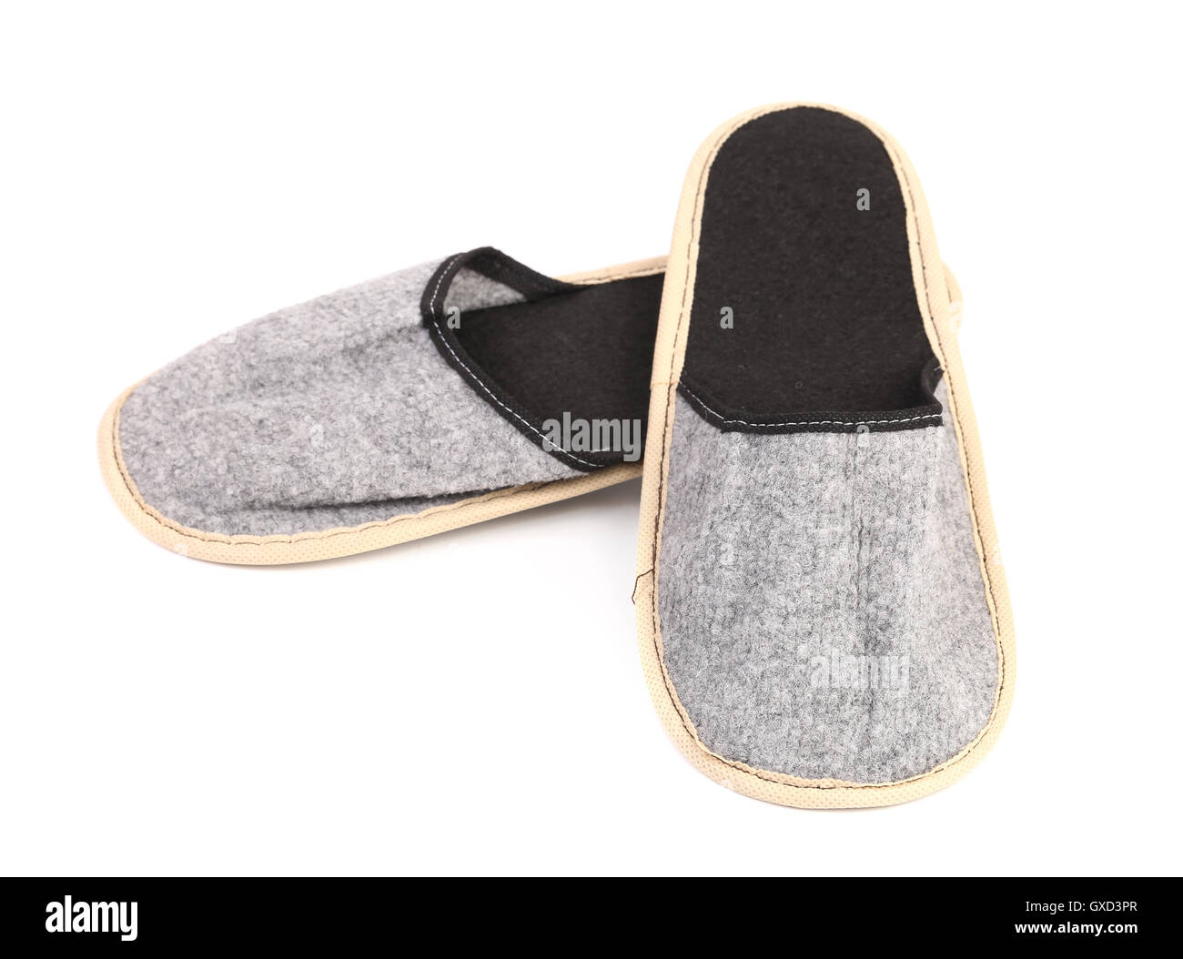 Gray slippers on a white background Stock Photo - Alamy