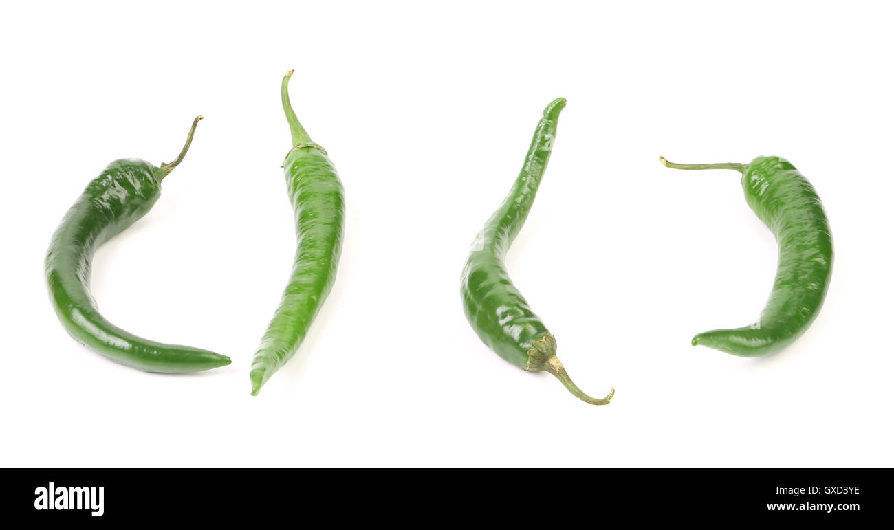 Four chili green pepper Stock Photo - Alamy