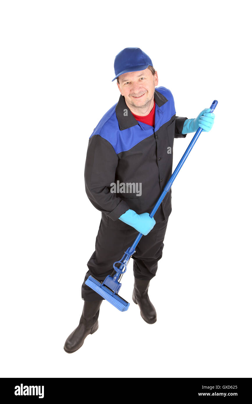 Man with cleaning broom Stock Photo - Alamy