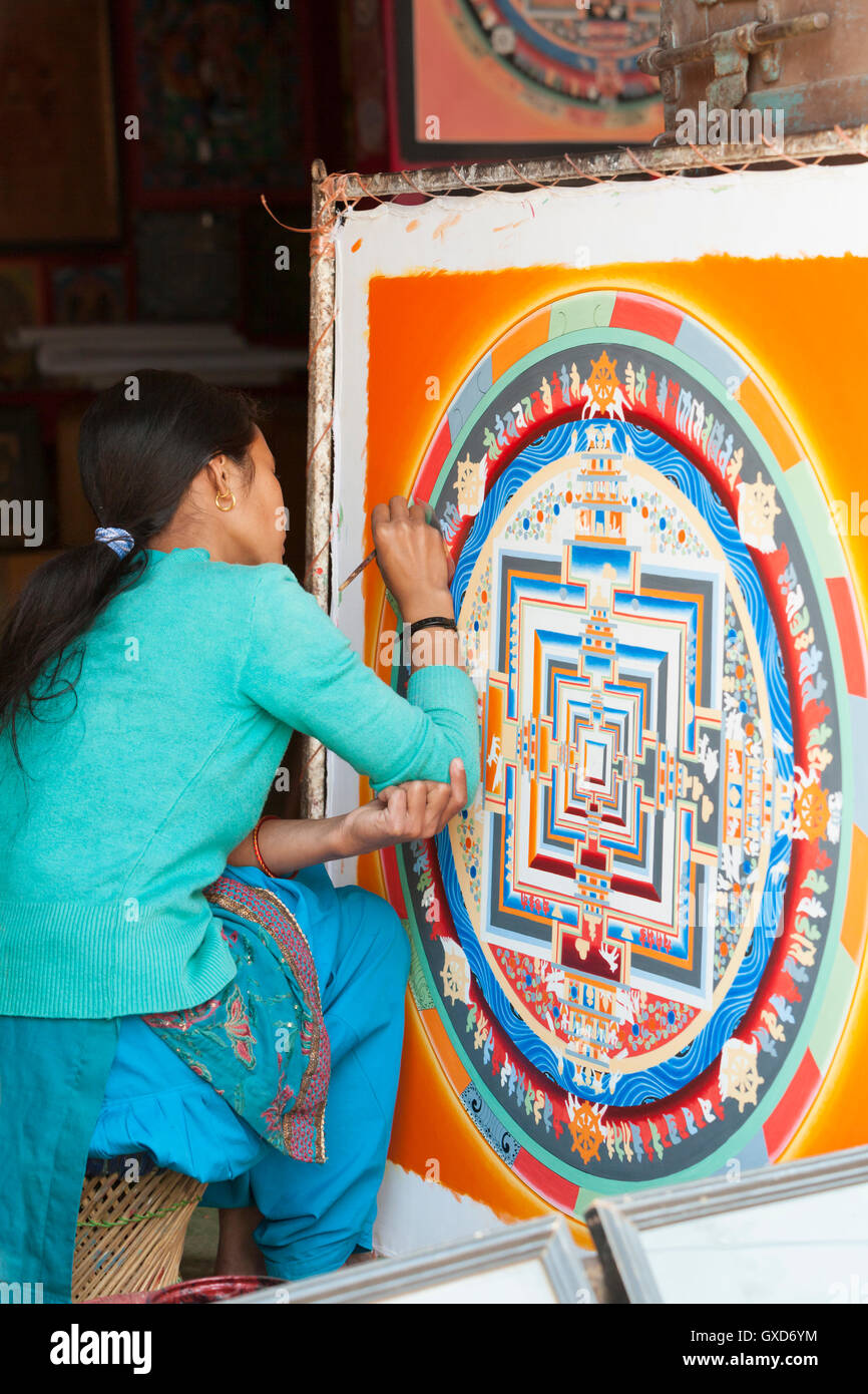 Artist at work on a mandala in a local handicraft shop near Bhaktapur ...