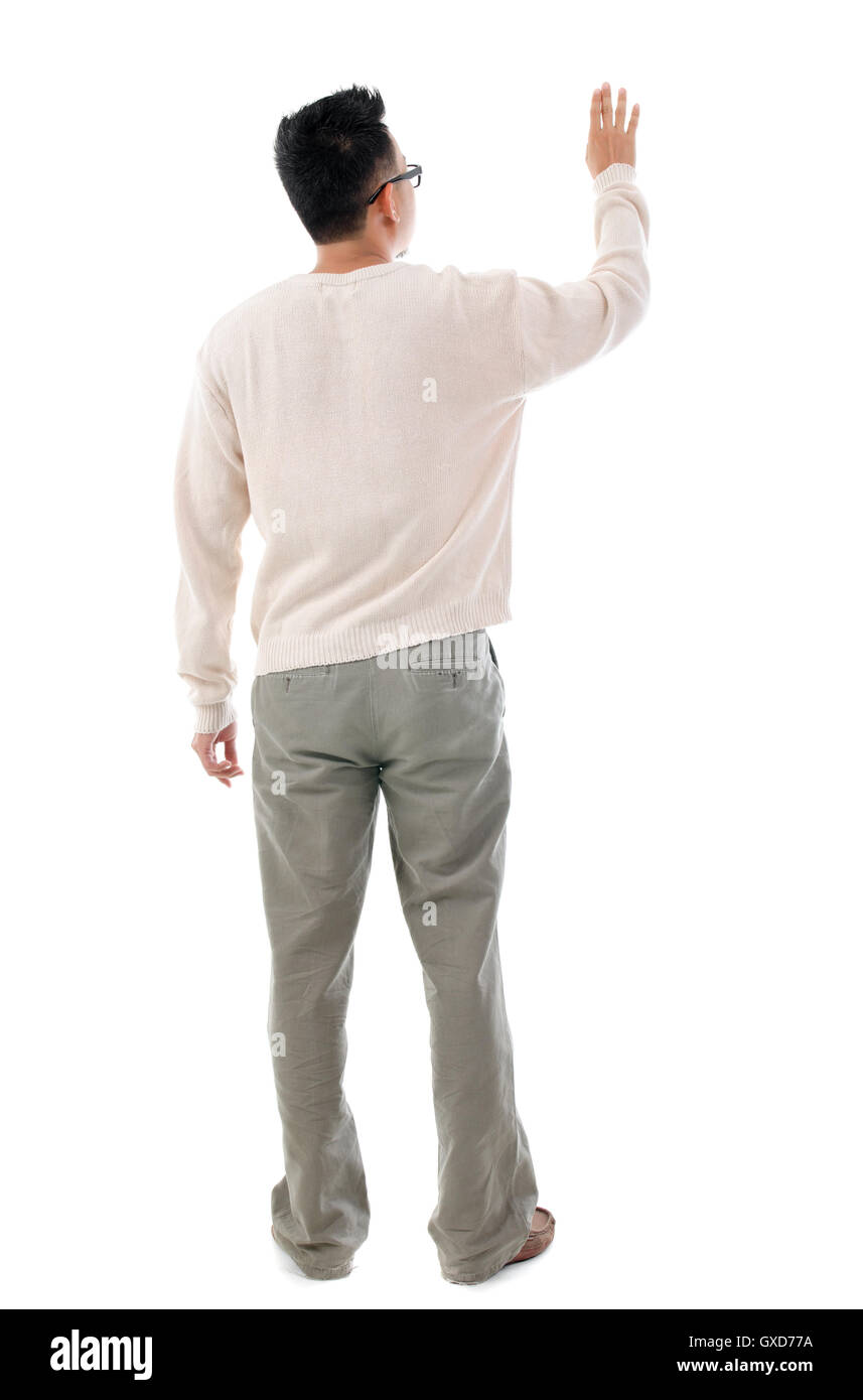 Rear view Asian man touching on transparent virtual screen Stock Photo ...