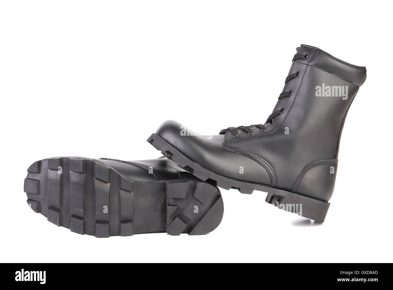 Pair of black boots with rough treads Stock Photo - Alamy