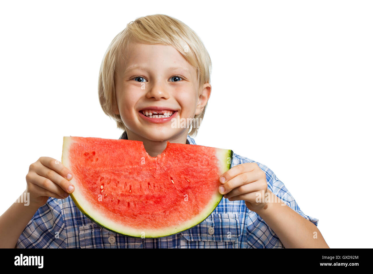 Cute happy laughing boy eating water melon Stock Photo - Alamy