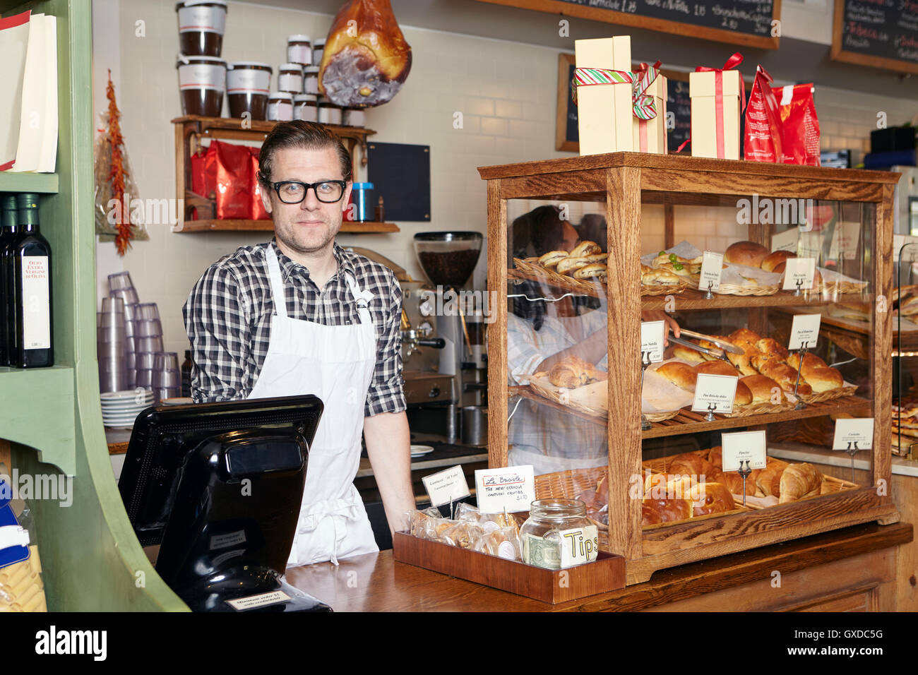 Portrait of male worker in bakery Stock Photo - Alamy