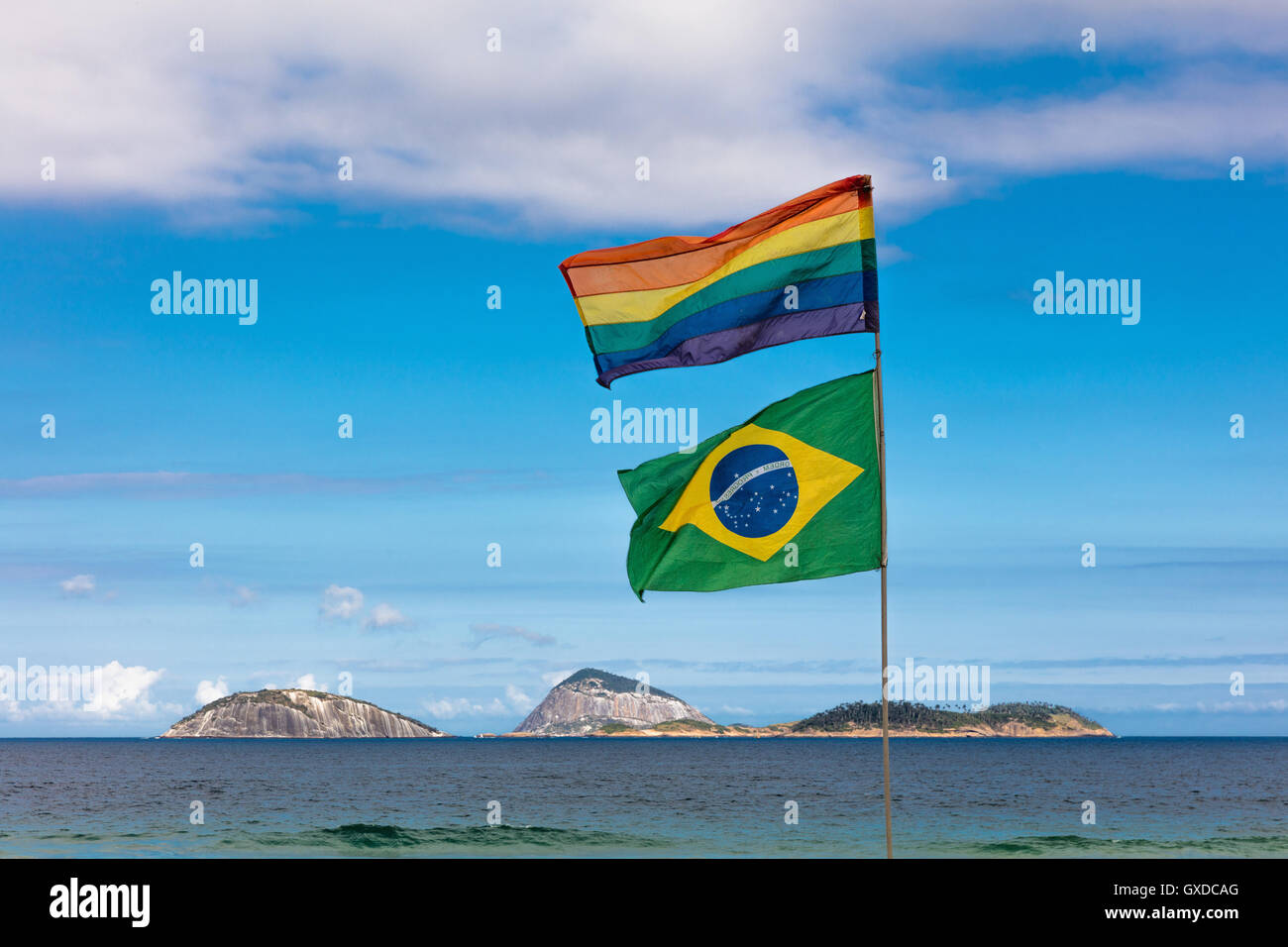 Flags flying on beach, Ipanema, Cagarras islands, Rio de Janeiro ...
