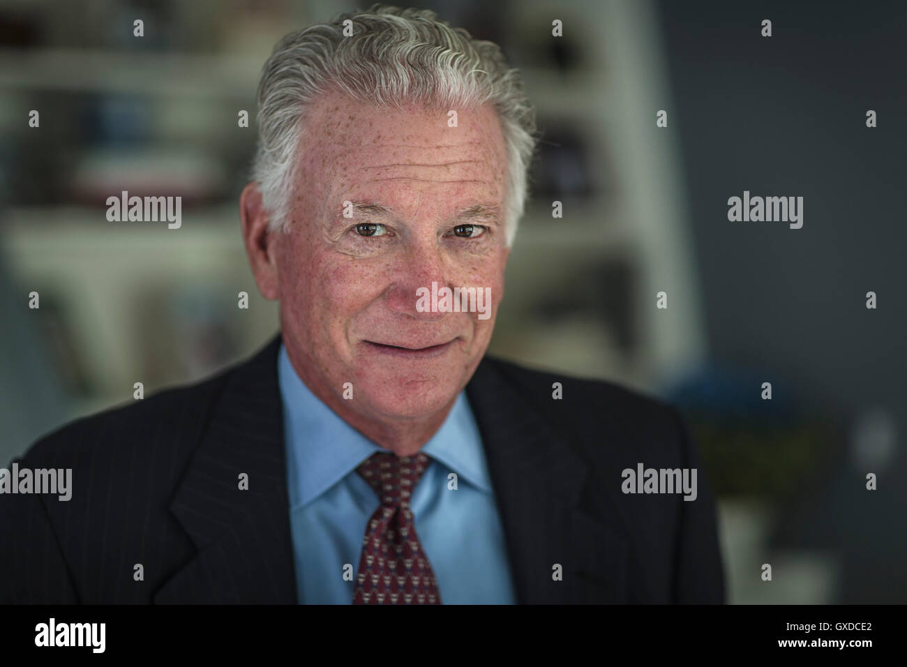 Grey haired businessman hi-res stock photography and images - Alamy