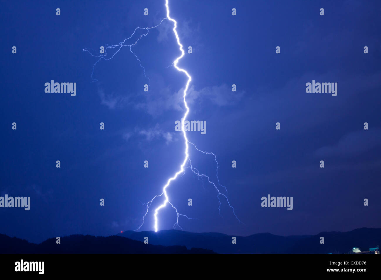Lightning Strikes over night landscape Stock Photo - Alamy