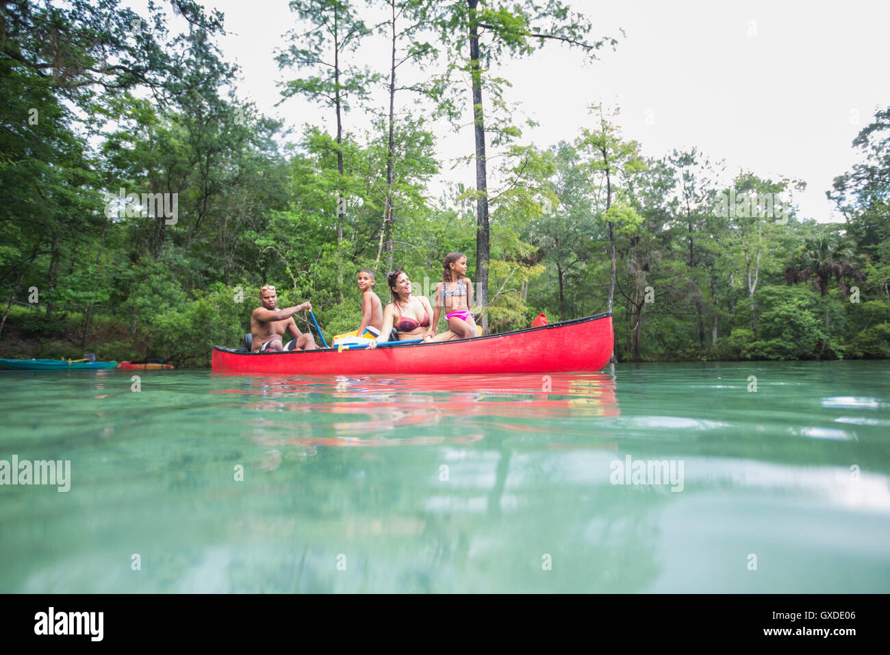 Family on a canoe trip together at Econfina Spring, Florida, USA Stock ...