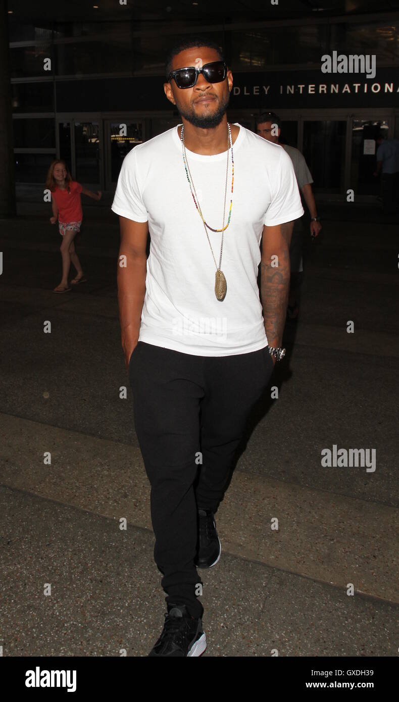 Usher arrives at Los Angeles International Airport Featuring: Usher ...