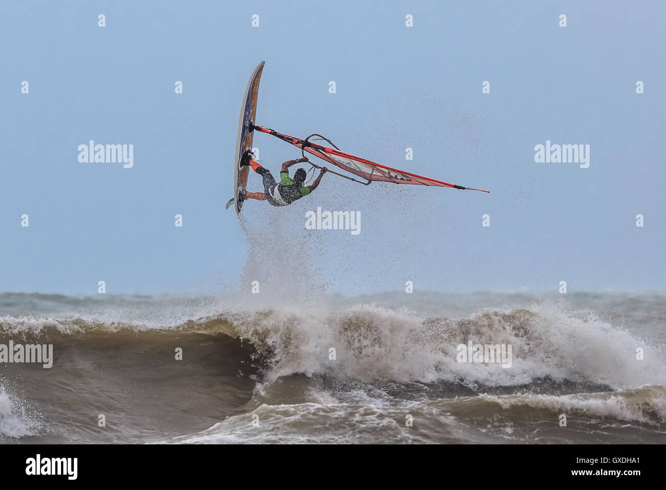 Flying the waves windsurfing Stock Photo - Alamy