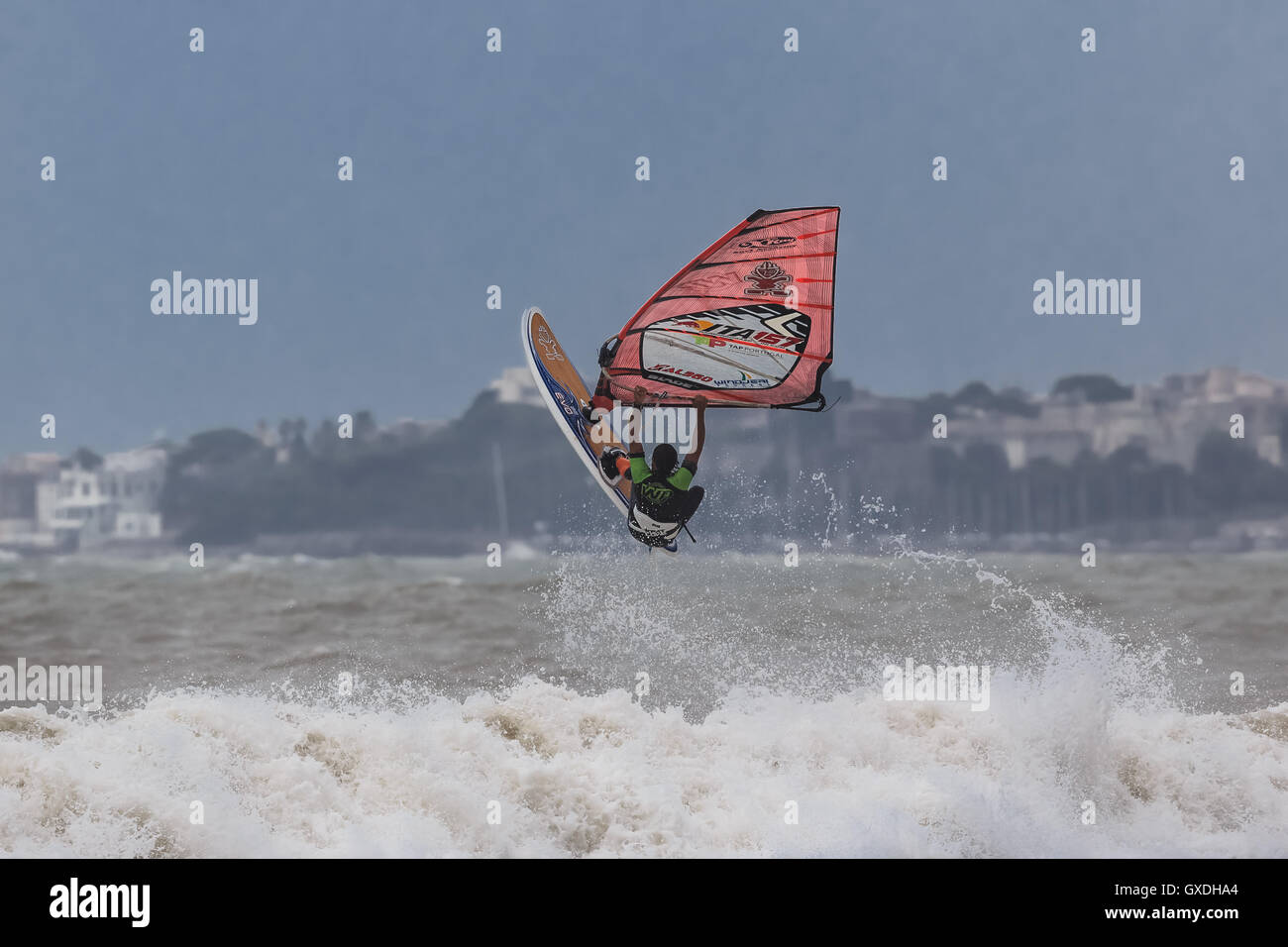 Flying the waves windsurfing Stock Photo - Alamy