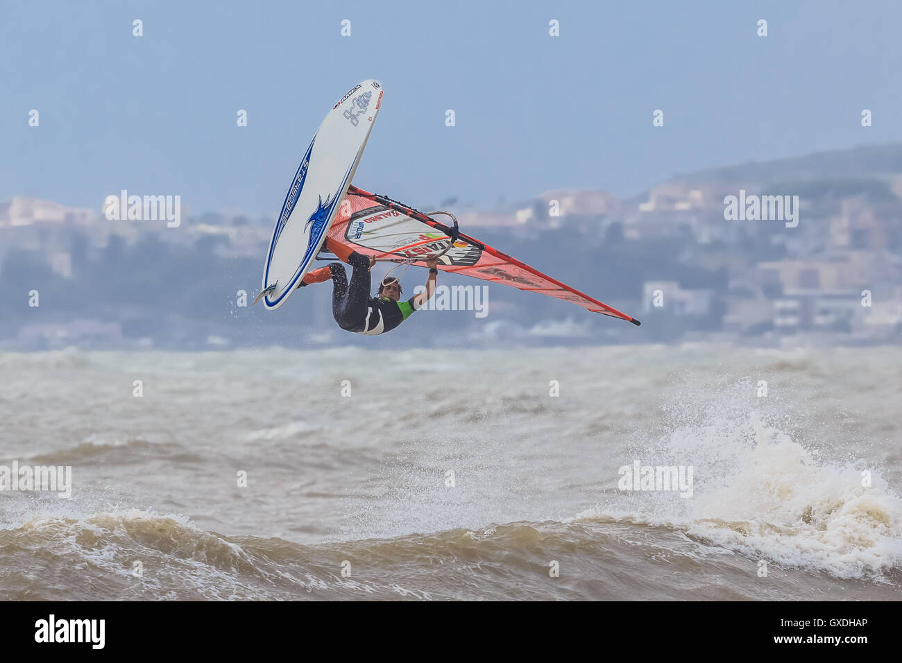 Flying the waves windsurfing Stock Photo - Alamy