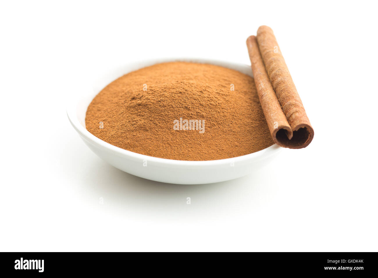 Cinnamon sticks and ground cinnamon isolated on white background Stock ...