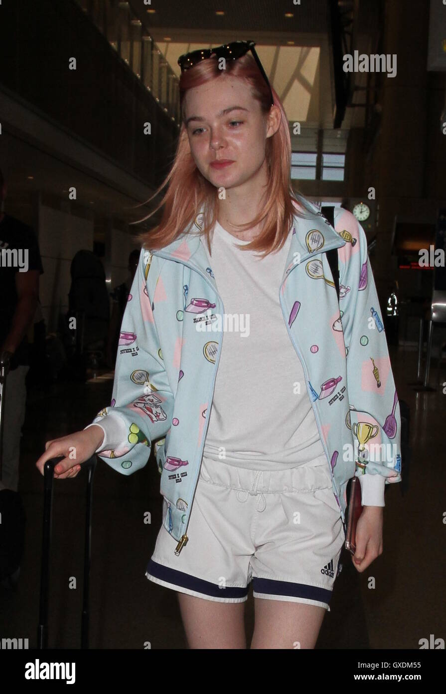 Elle Fanning shows off her new hair color at Los Angels International ...