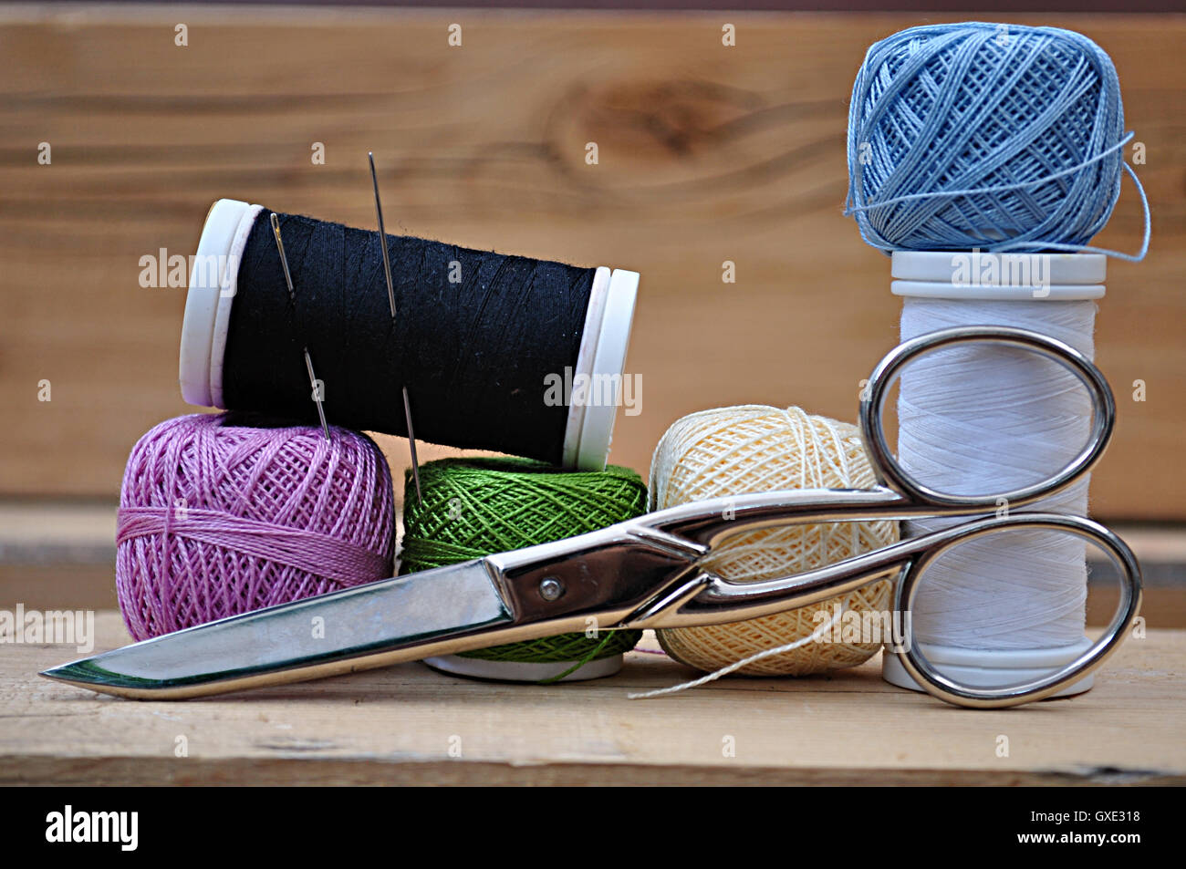 spools of thread,scissors, needles Stock Photo - Alamy
