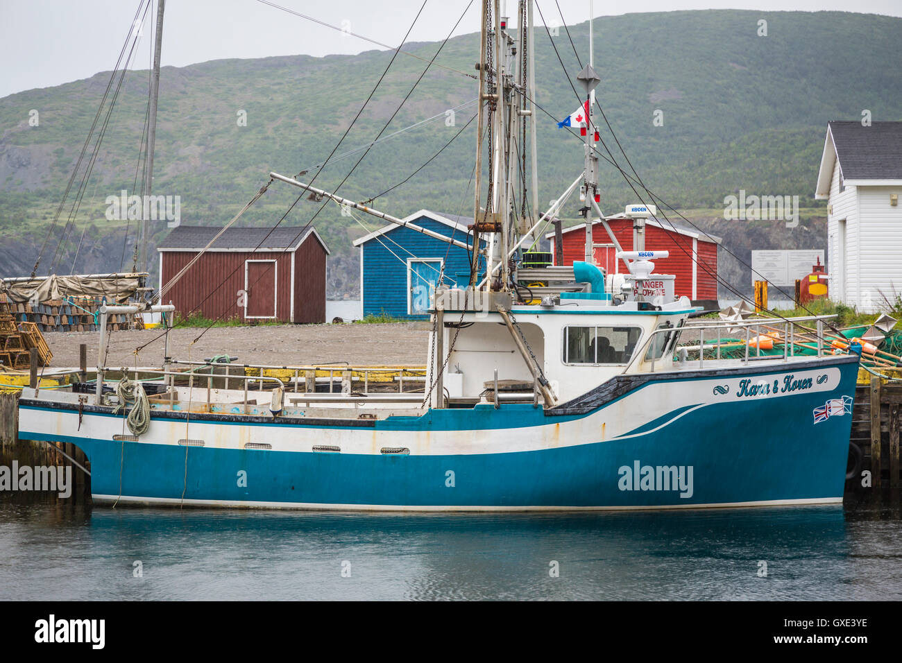 The harbor, fishing boats and colorful fishing stages in Trout River ...
