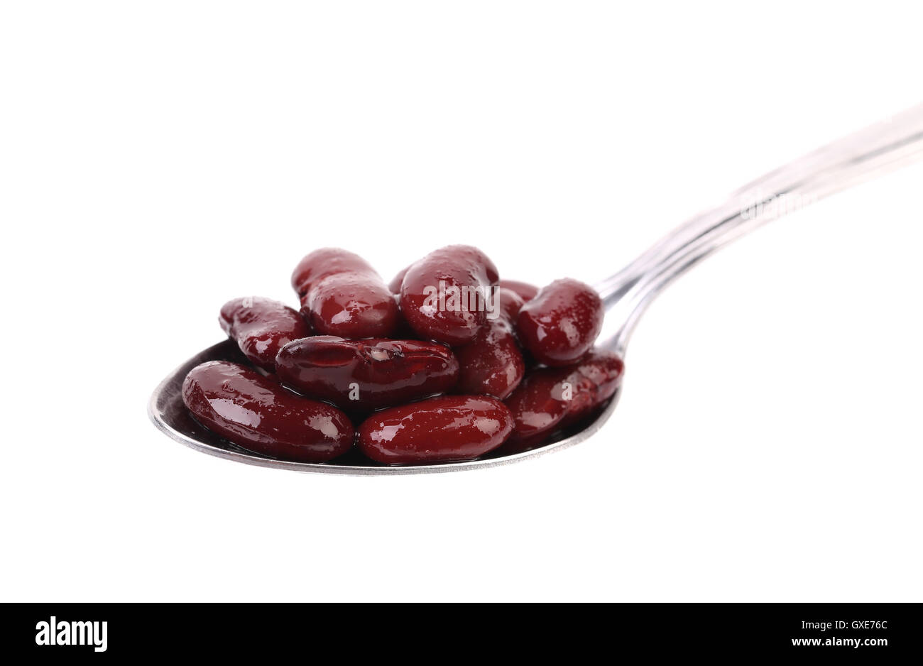 Preserve beans on a spoon Stock Photo - Alamy