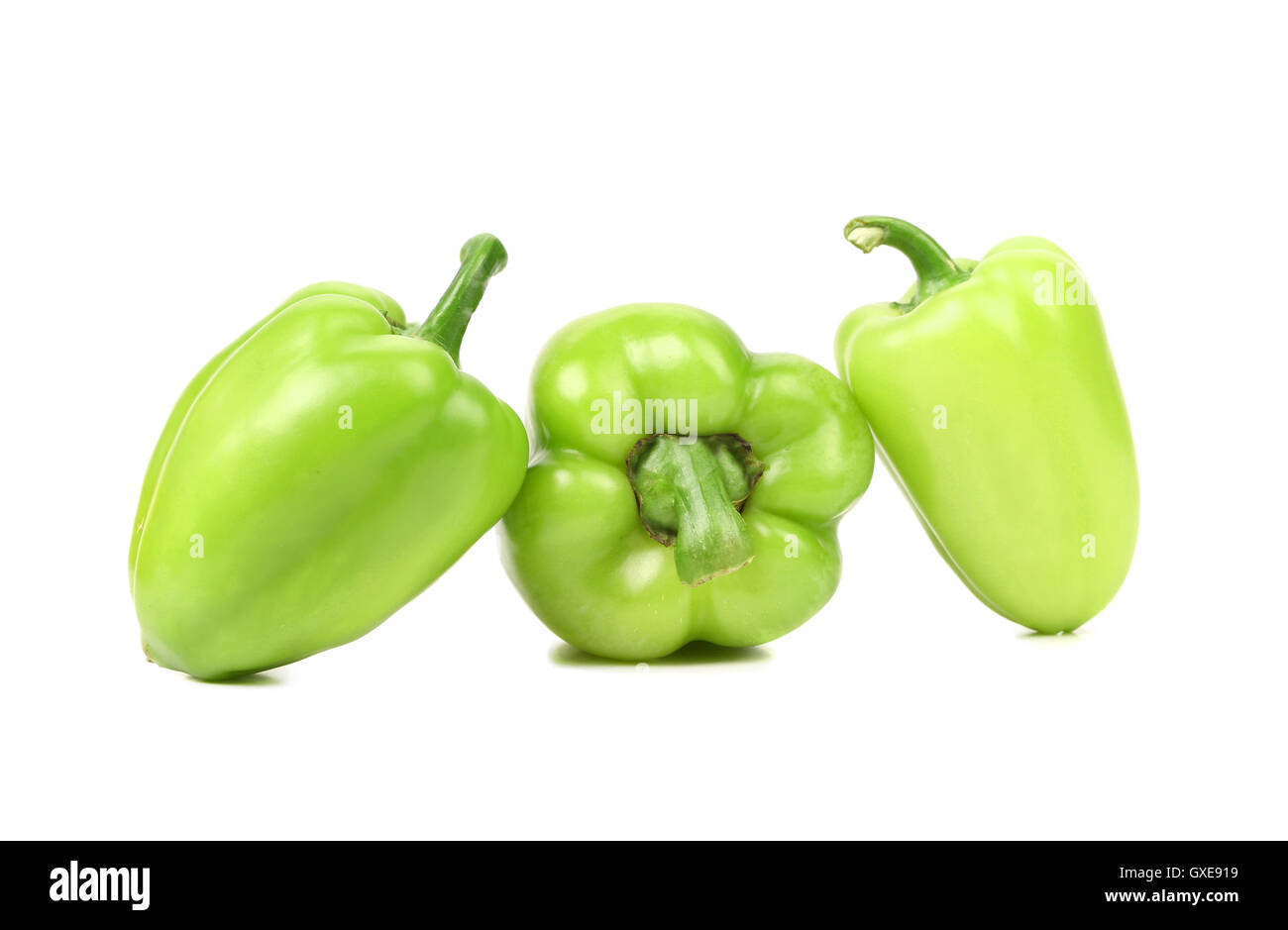 Three green peppers Stock Photo - Alamy