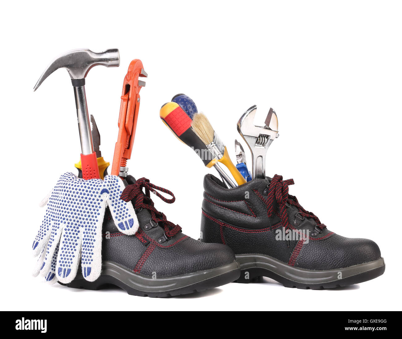 Working tools in boots Stock Photo - Alamy
