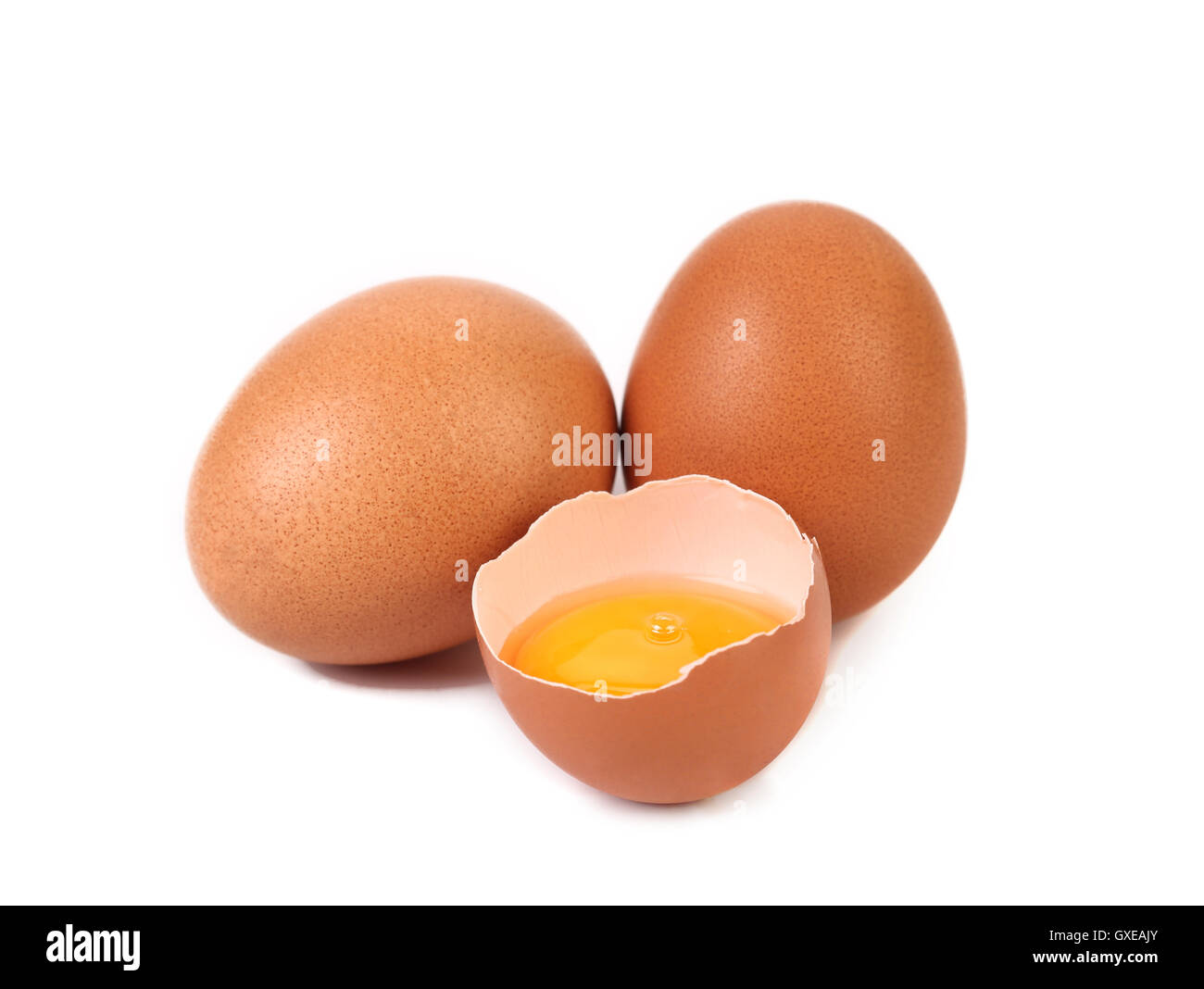 Whole eggs and broken egg Stock Photo - Alamy