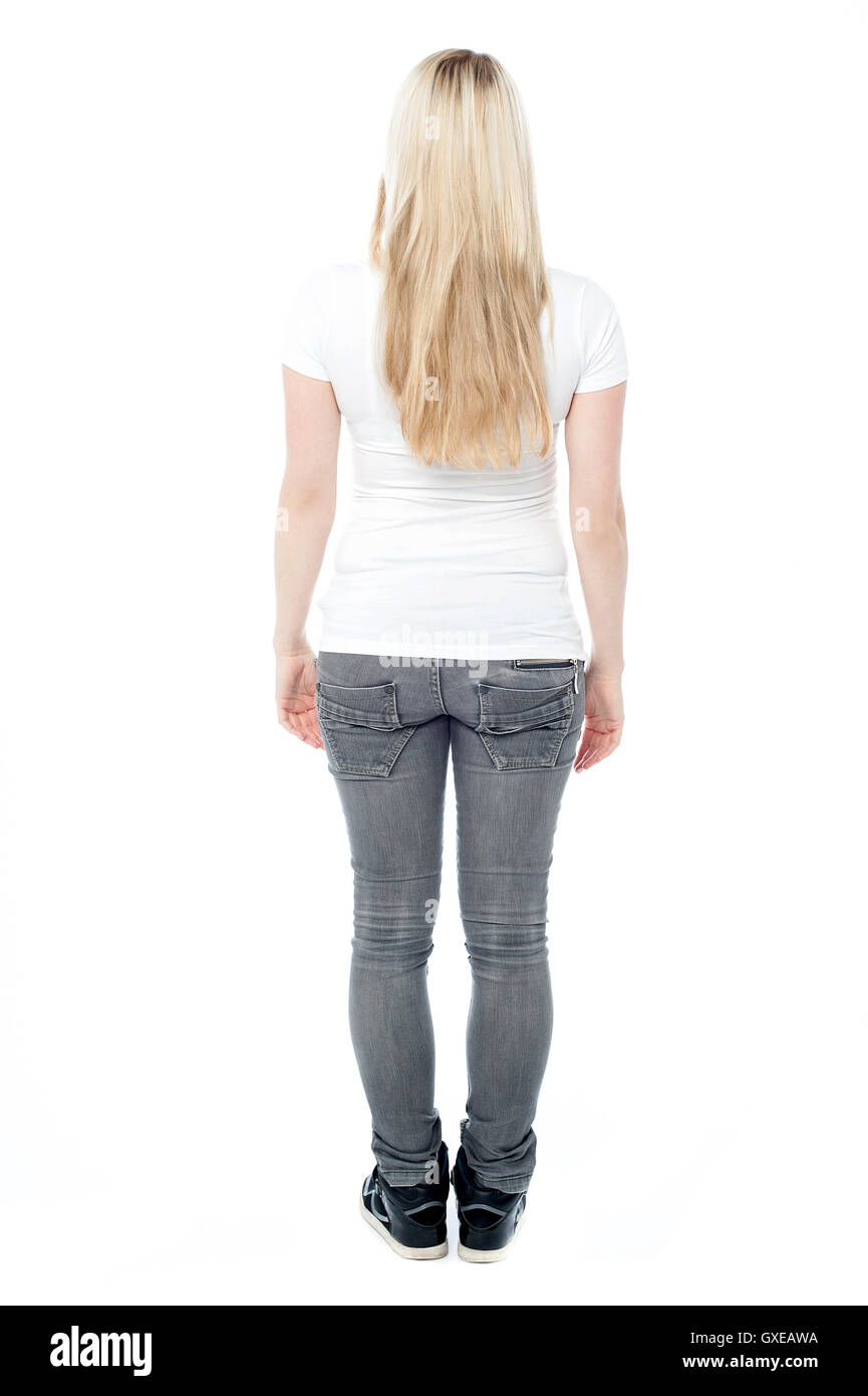 Back pose of casual young female Stock Photo - Alamy