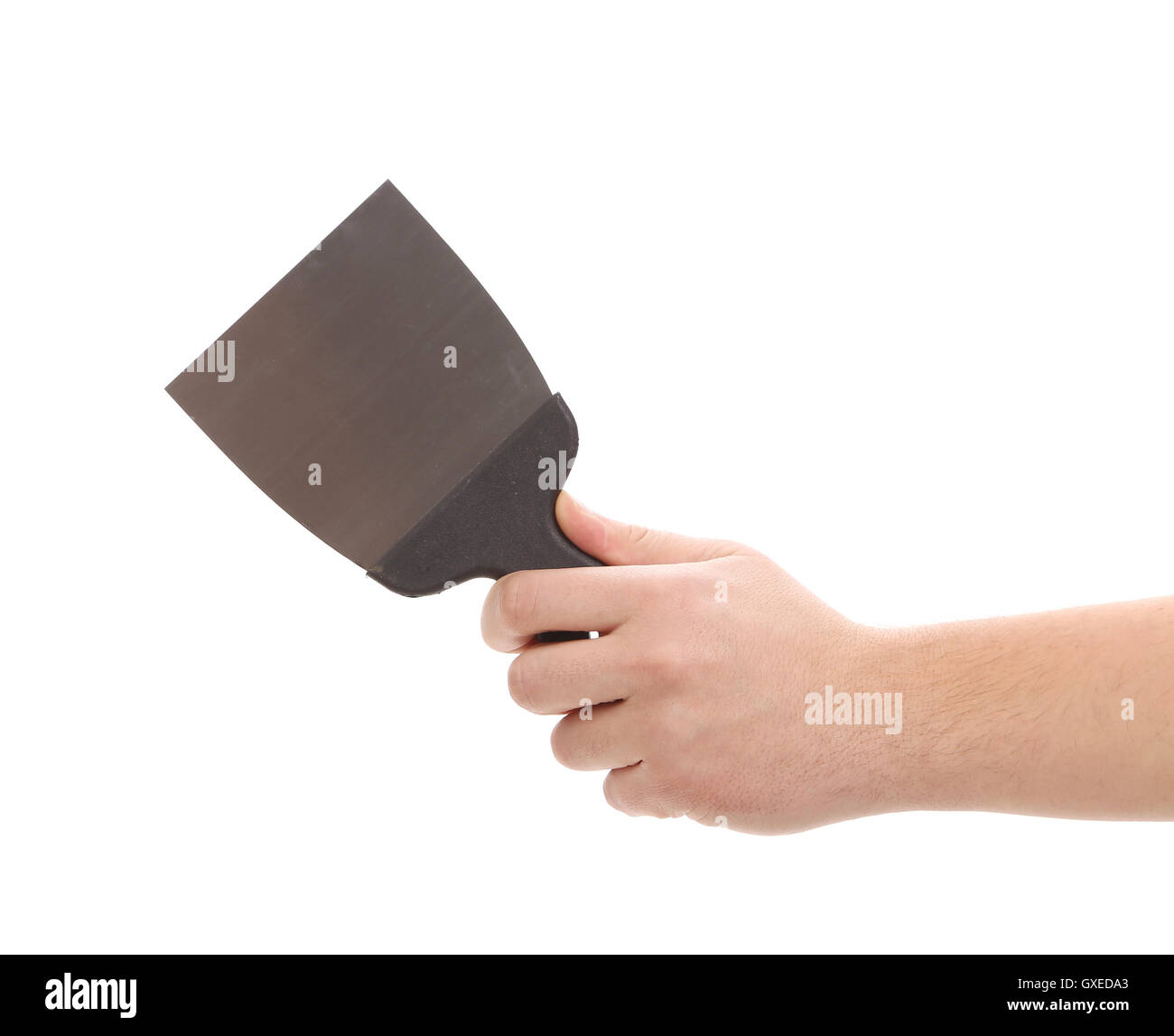 Hand holds construction spatula Stock Photo - Alamy