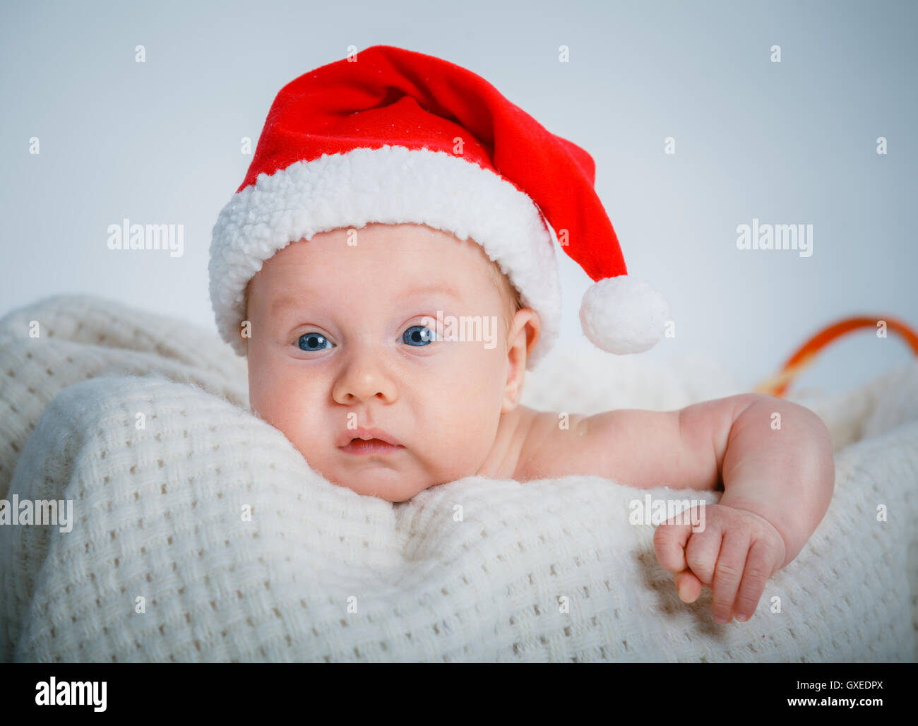 Baby in a santa suit Stock Photo - Alamy